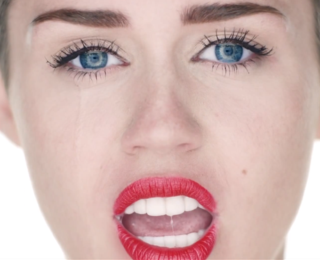 Miley Cyrus: The 11 Most OMG Moments In Her 'Wrecking Ball' Video - Capital